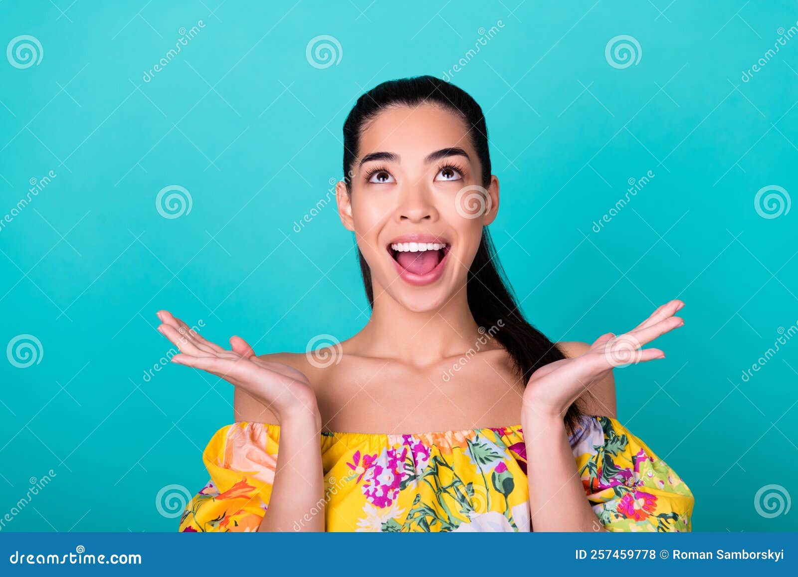 Photo Of Impressed Young Brunette Lady Look Empty Space Wear Floral Top