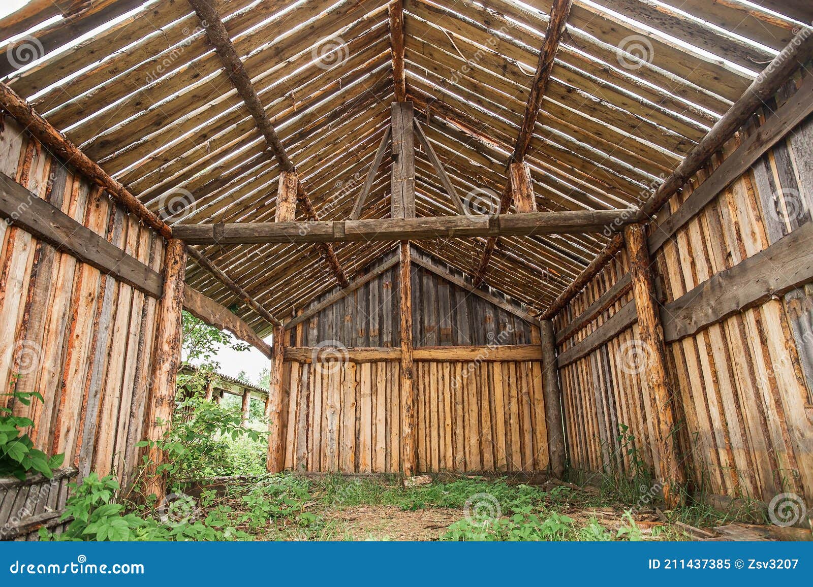 Photo Inside a Barn with Light Streaming in through Siding. Stock Image ...