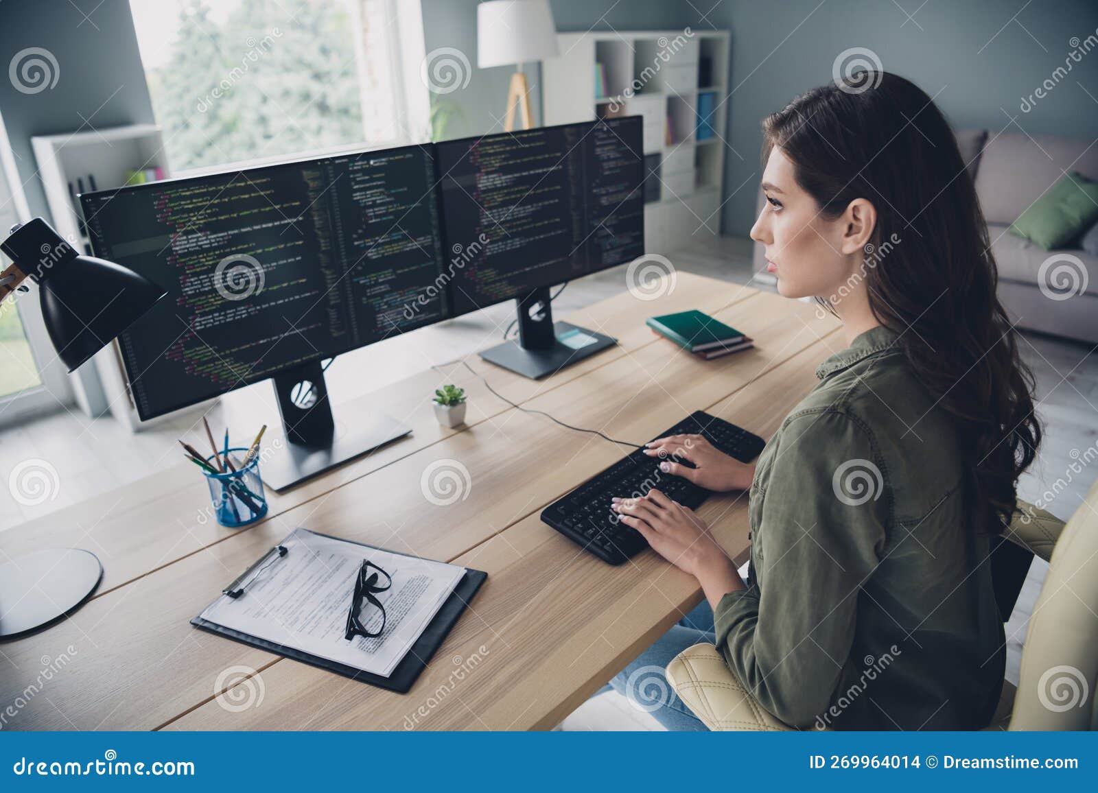 Photo of Intelligent Serious Lady Hacker Signed Document Security ...