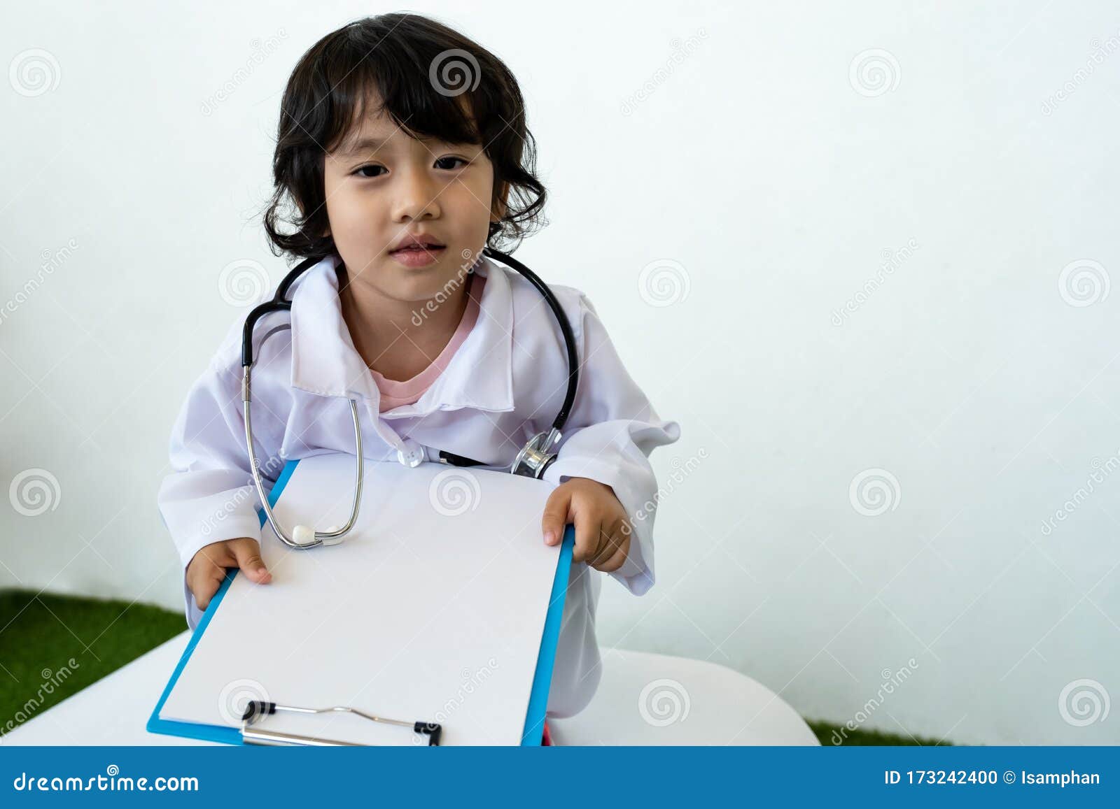 Photo of Kid Doctor with Stethoscope on White Background Stock Photo ...