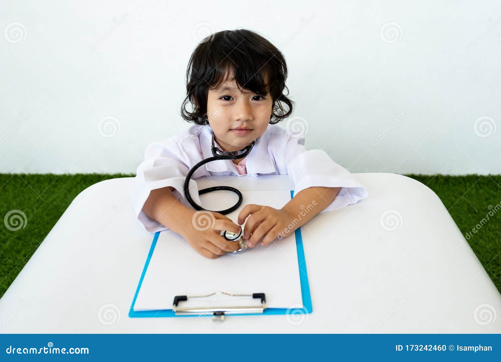 Photo of Kid Doctor with Stethoscope on White Background Stock Photo ...
