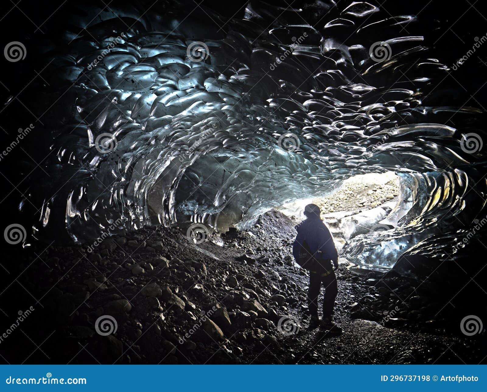 Photo of a Man Exploring an Ice Cave in Iceland Stock Photo - Image of ...