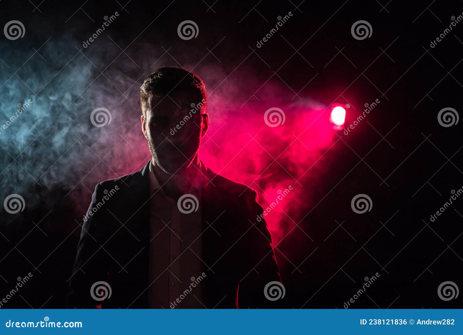 Photo of Man Looking at Camera in Pink Light. Stock Photo - Image of ...