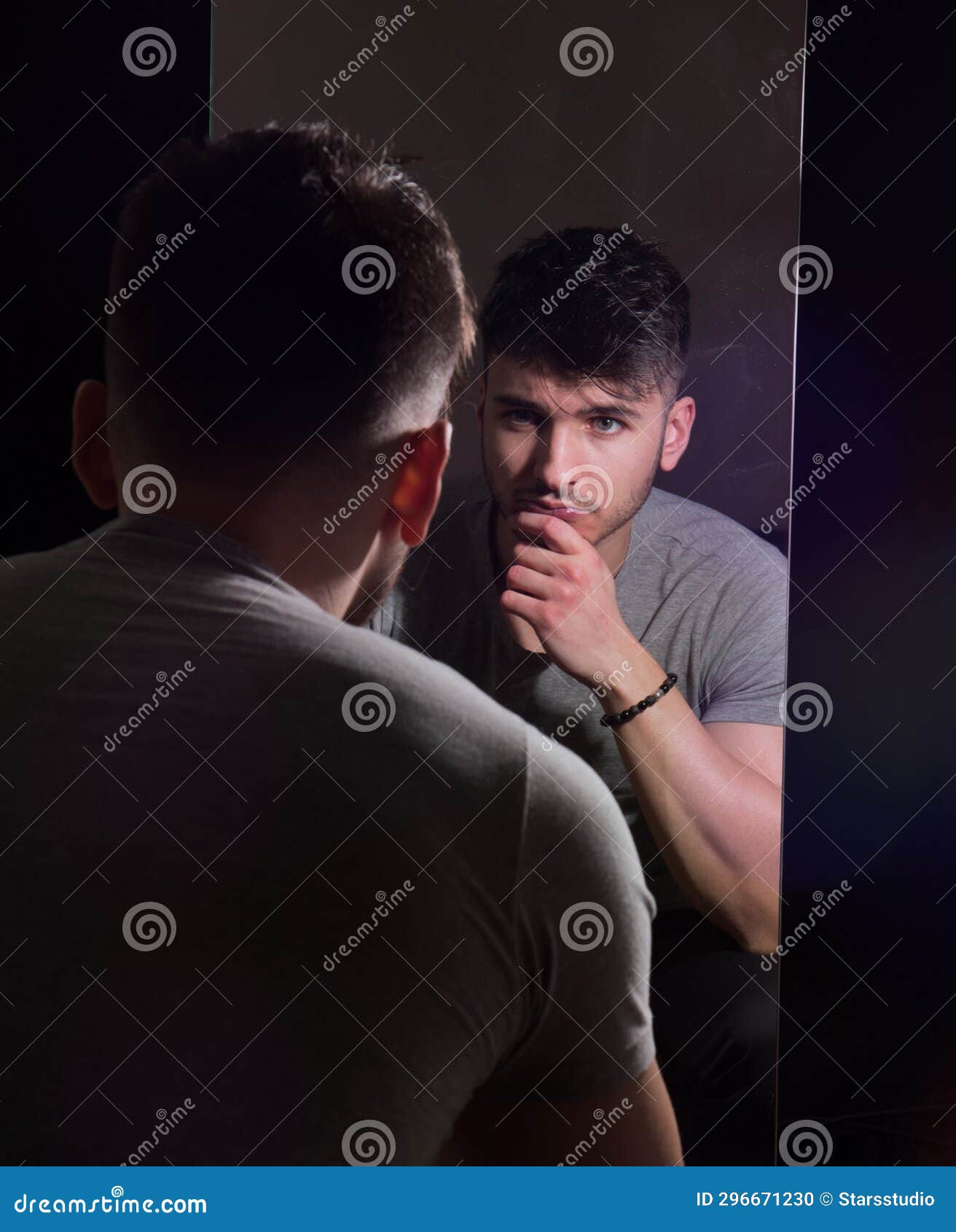 Photo of a Man Reflecting on Himself in the Mirror Stock Photo - Image ...
