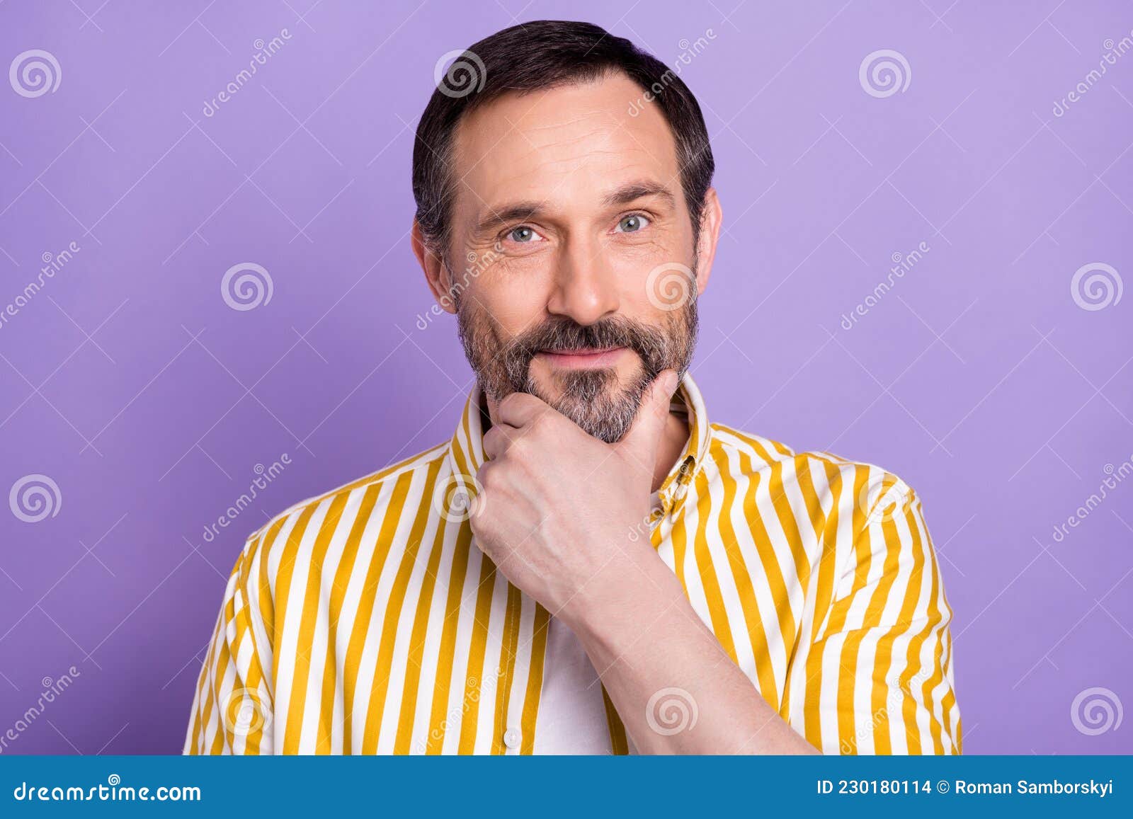 Photo Of Mature Minded Attractive Man Hold Hand Chin Good Mood Smile