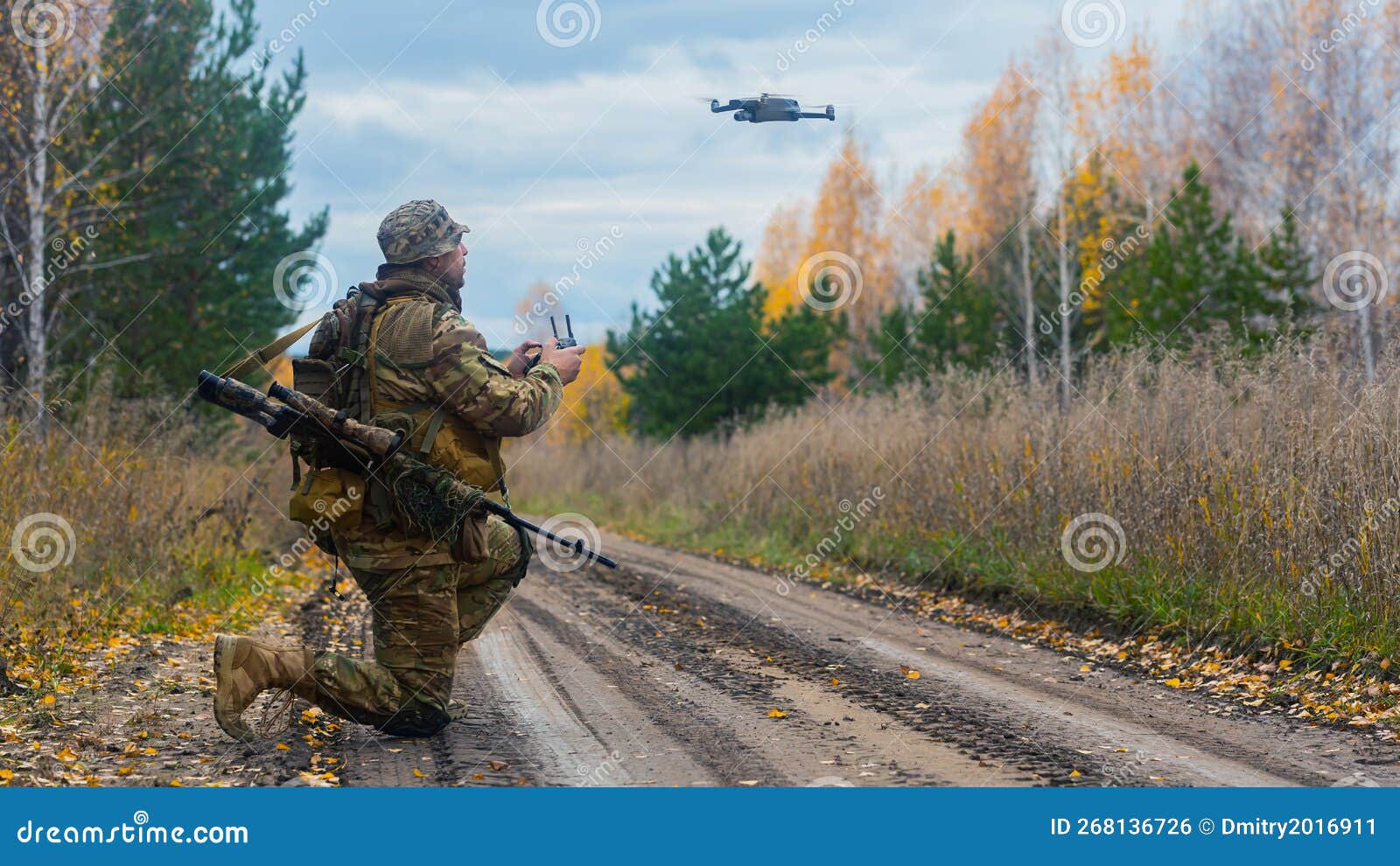 Photo of a Mercenary Soldier Launch a Reconnaissance Drone on the Road ...