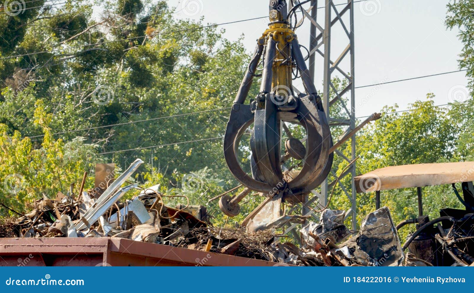 Image of Metal Claw Lifting Metal on Scrapyard Stock Photo - Image of ...
