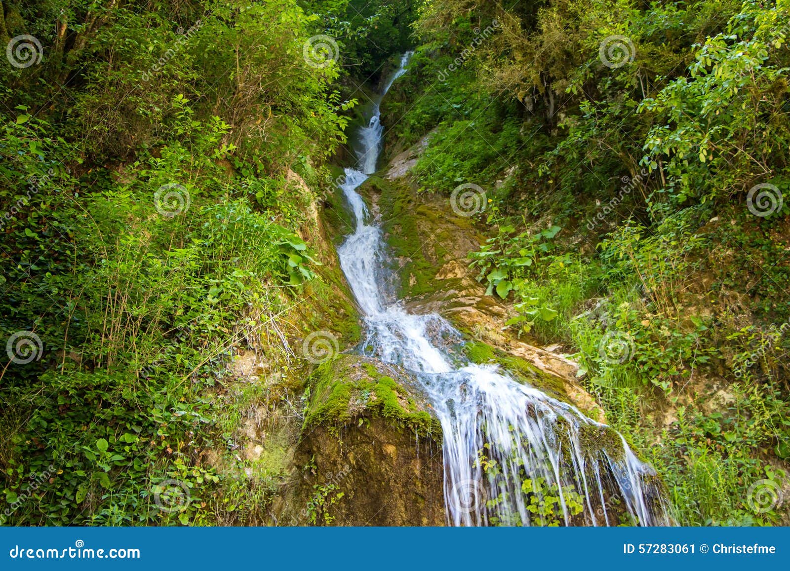 Photo of Narrow Waterfall among Grass Stock Image - Image of flowing ...