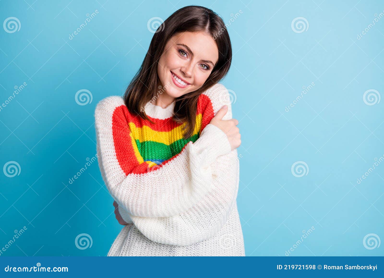 Photo Of Nice Optimistic Brunette Lady Hug Herself Wear Colorful