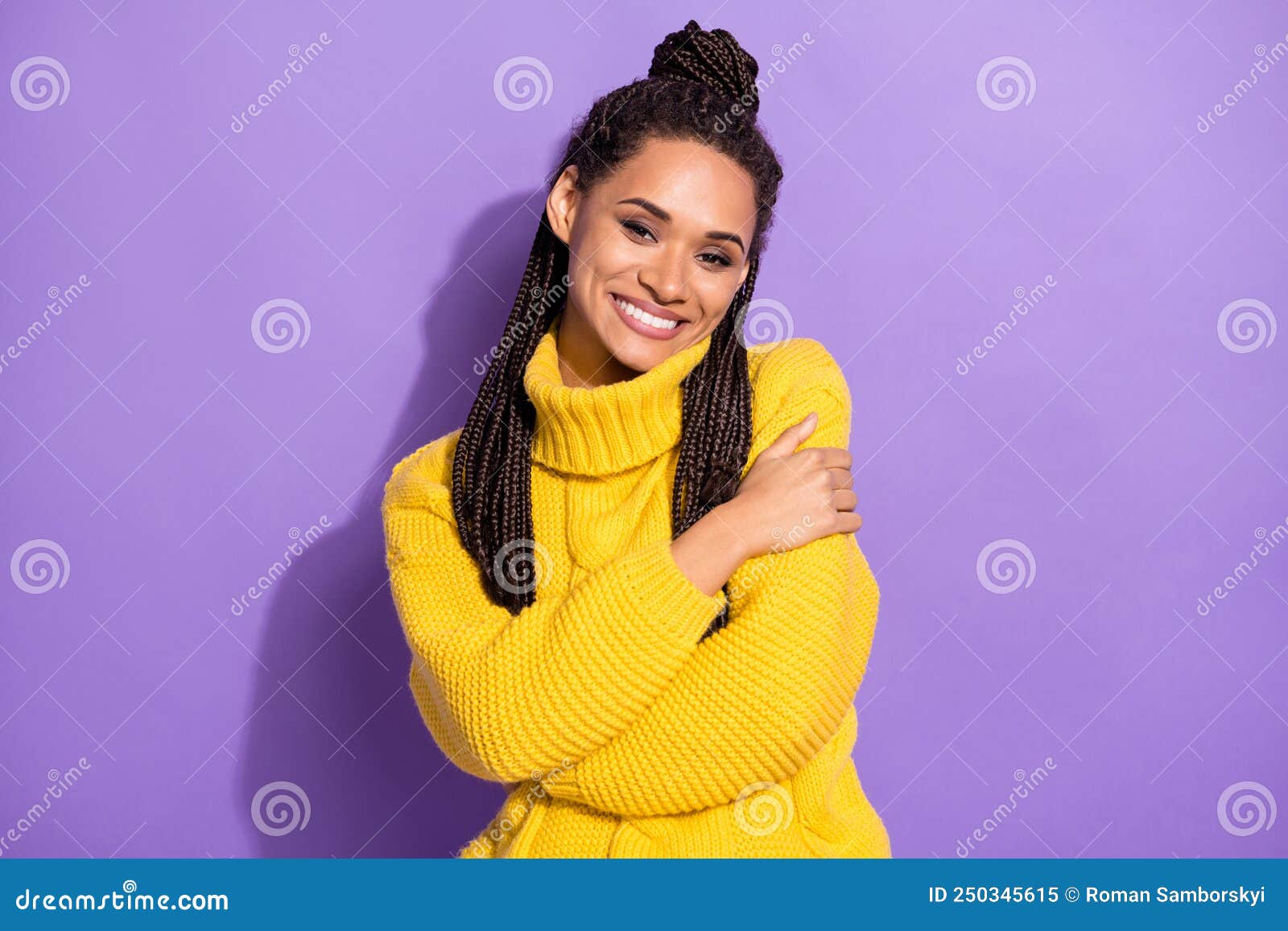 Photo Of Optimistic Nice Brunette Girl Hug Herself Wear Yellow Sweater