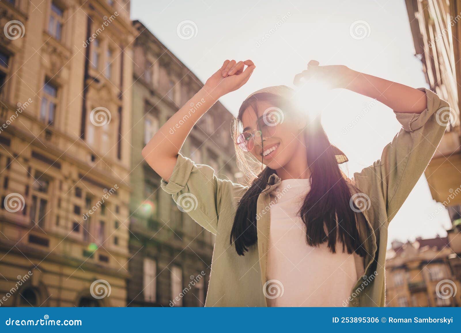 Photo Of Overjoyed Positive Lady Have Good Mood Rejoice Raise Hands