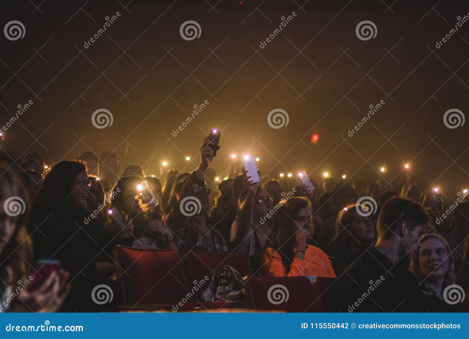 Photo Of People Holding Smartphones With Flashlight Picture. Image ...