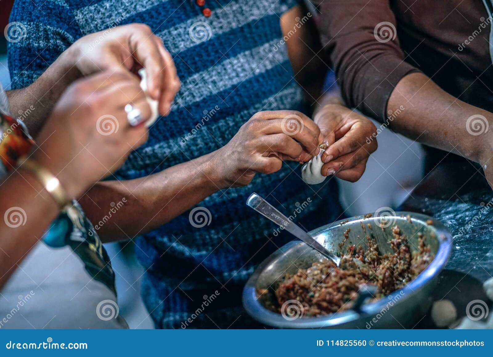 Photo Of People Making Dumplings. Picture Image: 114825560