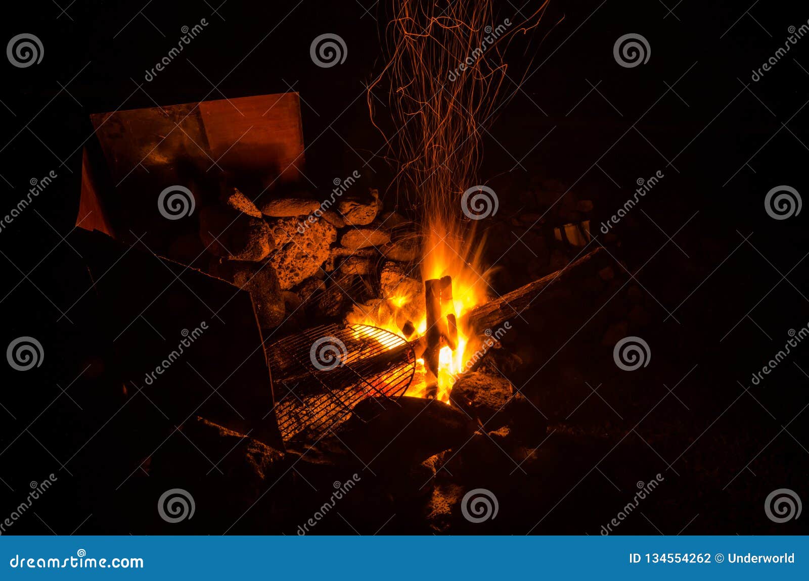 Camp fire in the night stock photo. Image of camping - 134554262