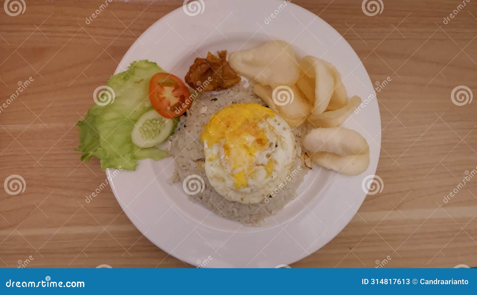Photo of a Plate of Indonesian Fried Rice with and Vegetable Stock ...