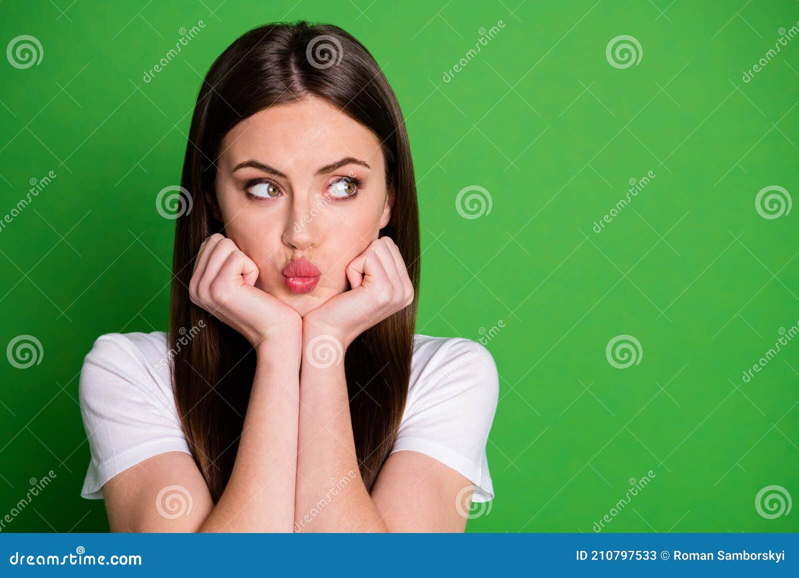 Photo Portrait Of Pouting Woman Holding Head With Two Hands Looking At