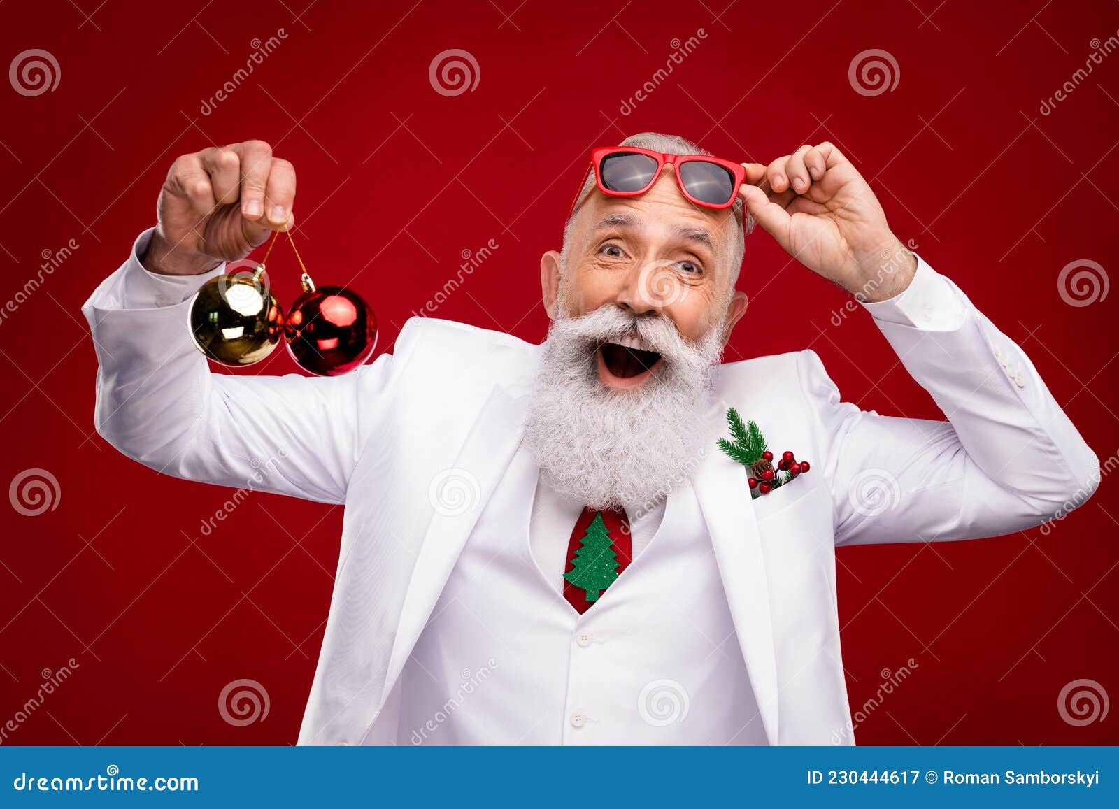 Photo Of Positive Amazed Shocked Man Hold Hands Decor Balls Wear Tree