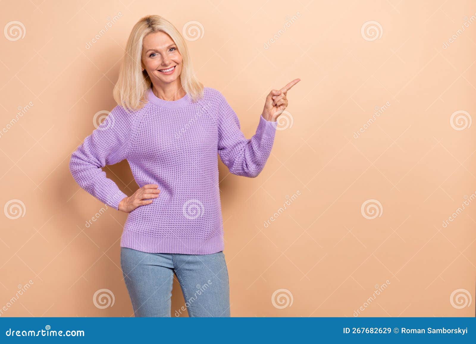 Photo Of Positive Cheerful Lady Blond Hairdo Wear Knit Sweater Hand On