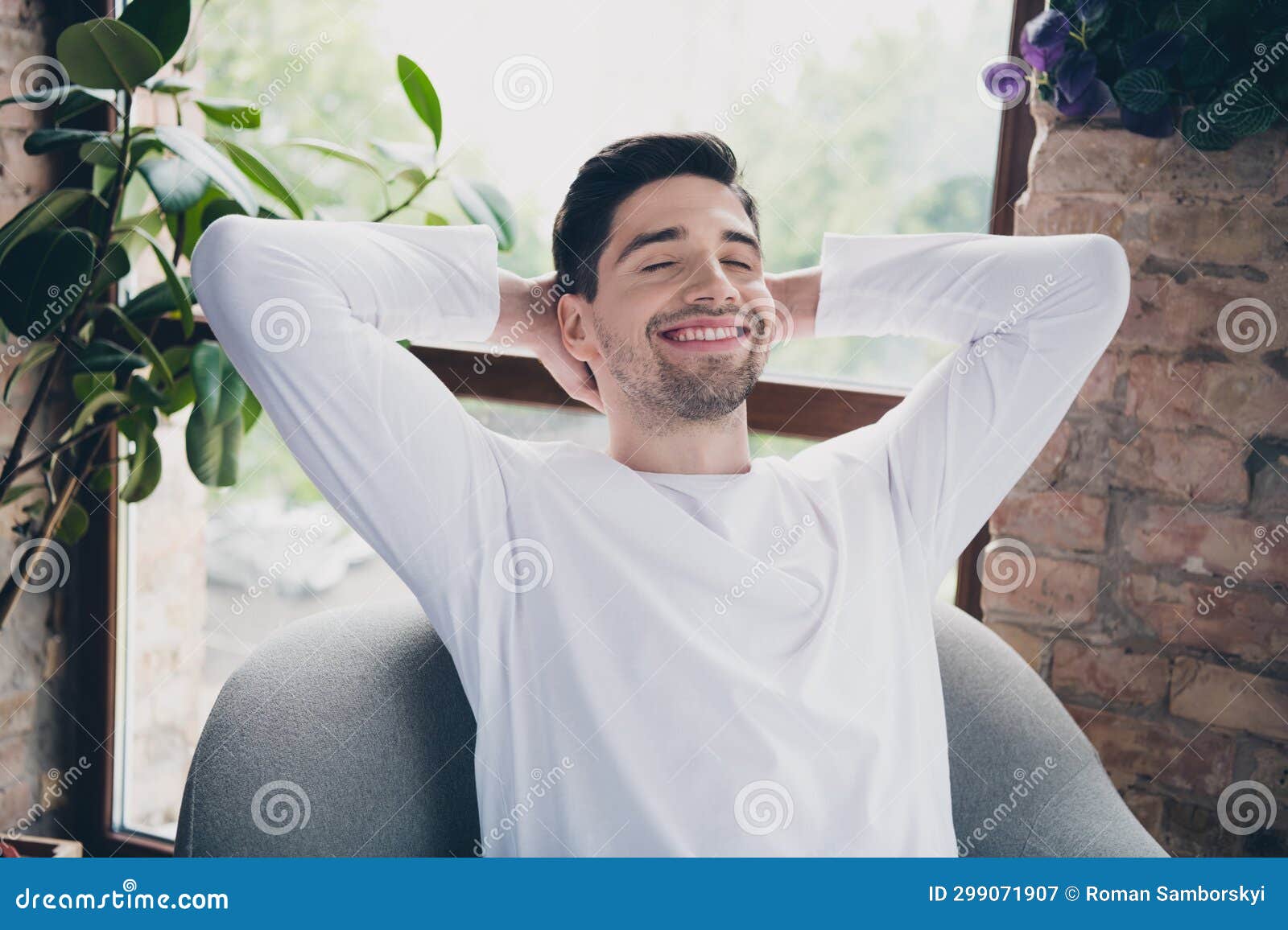 Photo Of Positive Dreamy Young Guy Wear White Shirt Closed Eyes Having