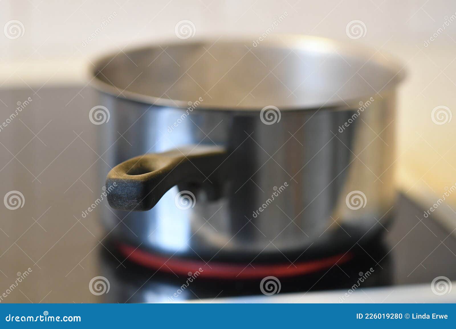 Photo of a pot on stove stock photo. Image of equipment - 226019280