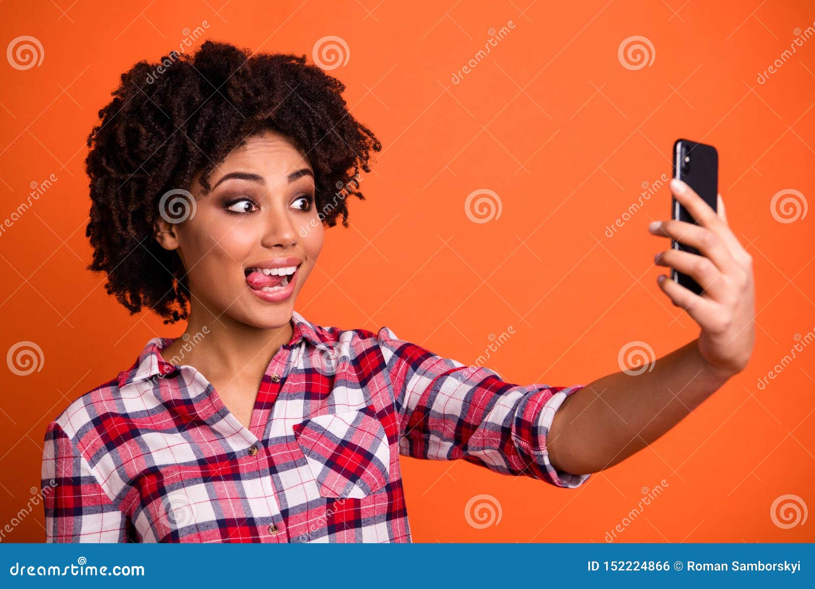 Photo Of Pretty Funky Lady Hold Hands Telephone Make Selfies Tongue Out