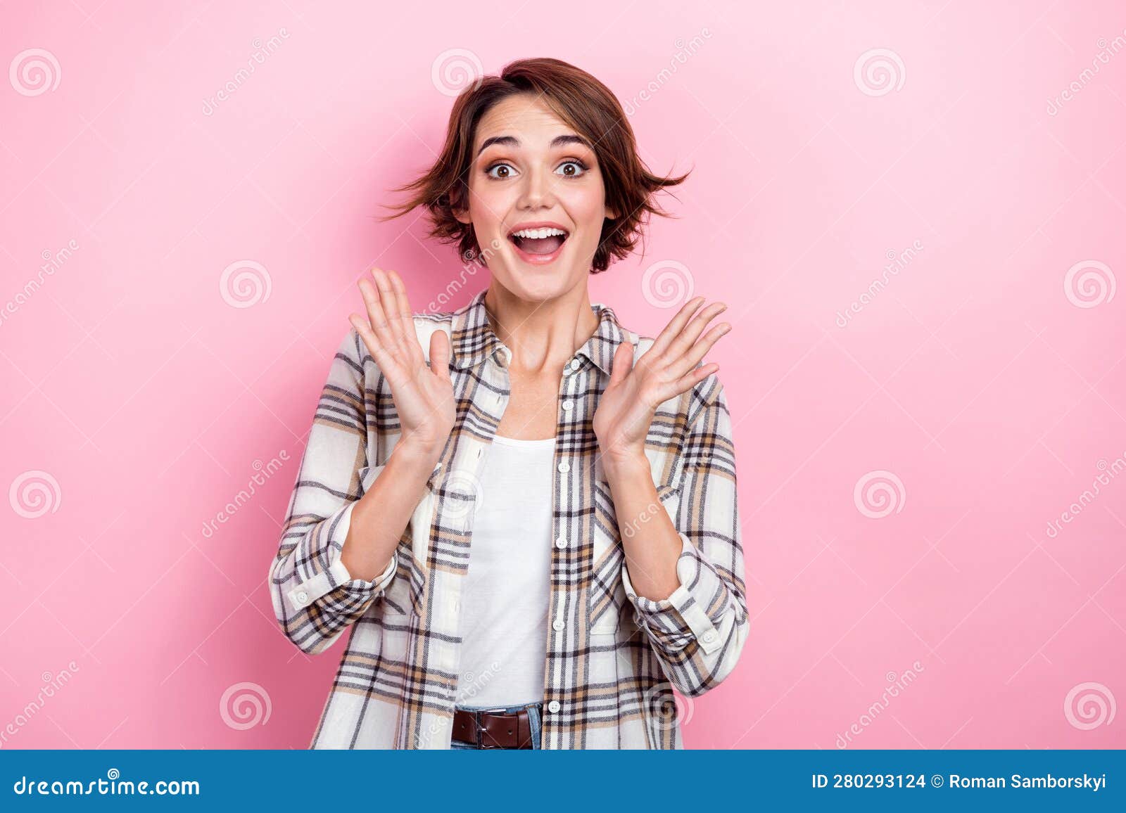 Photo Of Pretty Impressed Woman Dressed Plaid Shirt Rising Arms Open
