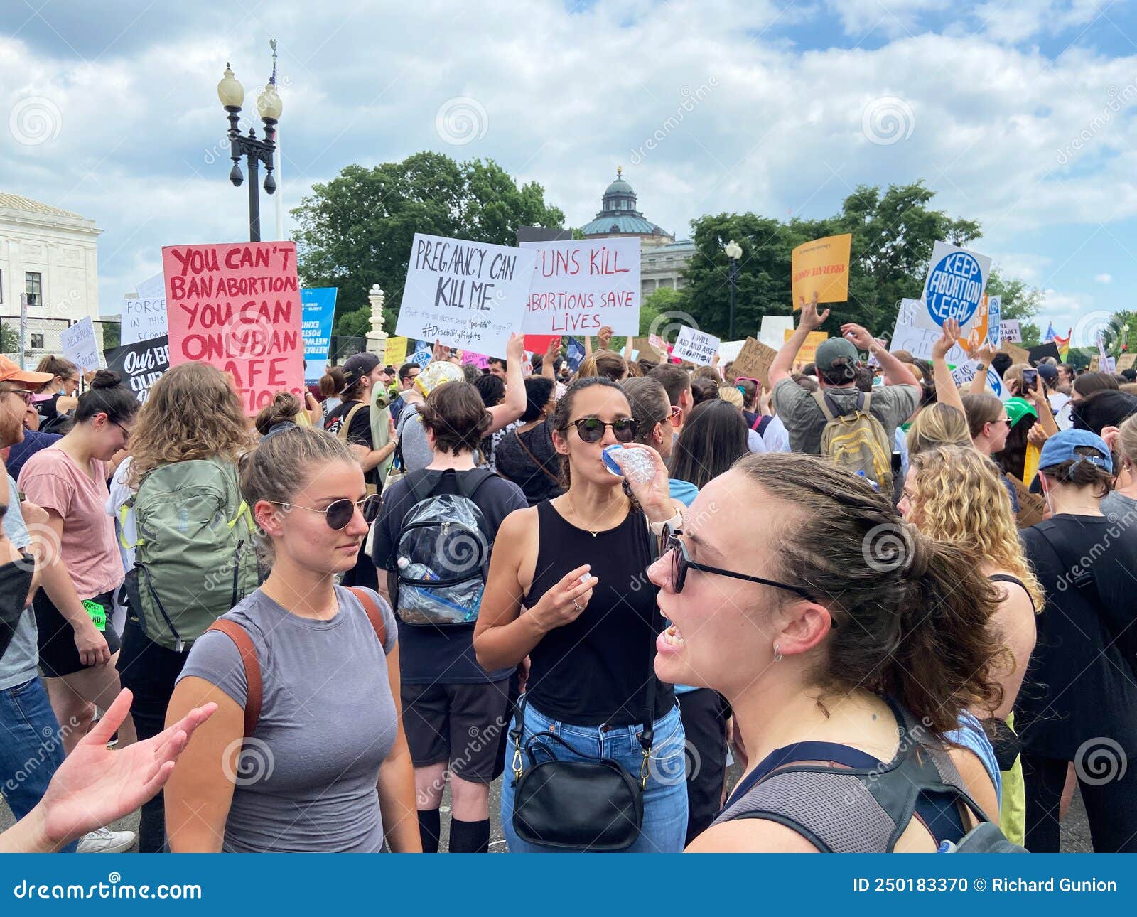 Many Supreme Court Protesters Bearing Signs In Washington Dc Editorial