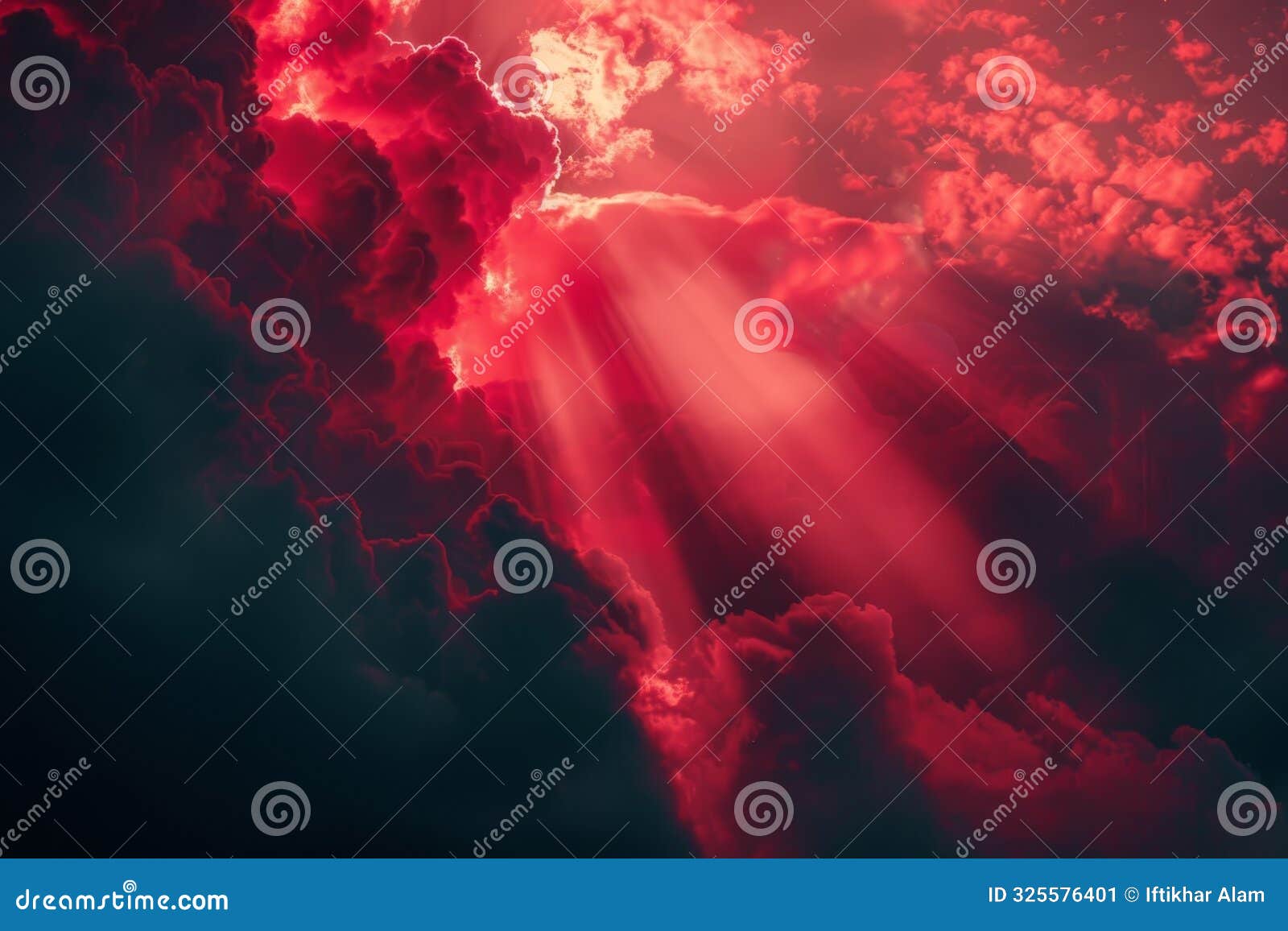 A Photo of Red Light Rays Shining through Dark Clouds, Creating a ...