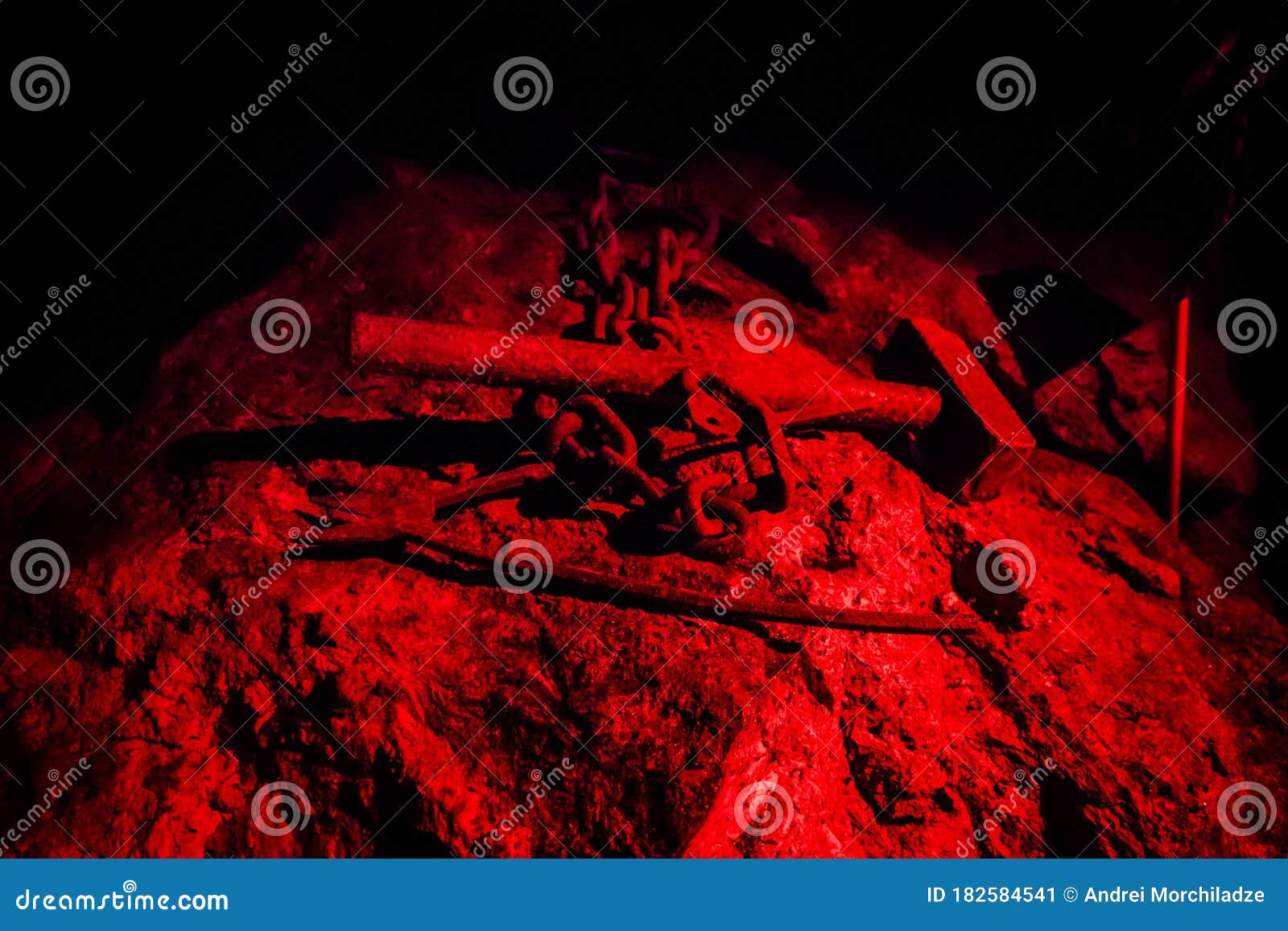 Old Rusty Tools on a Stone in an Abandoned Quarry in Red. Stock Image ...