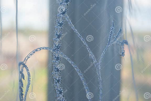 Photo of a Red Tulle on a Window with a Thread Pattern Stock Image ...