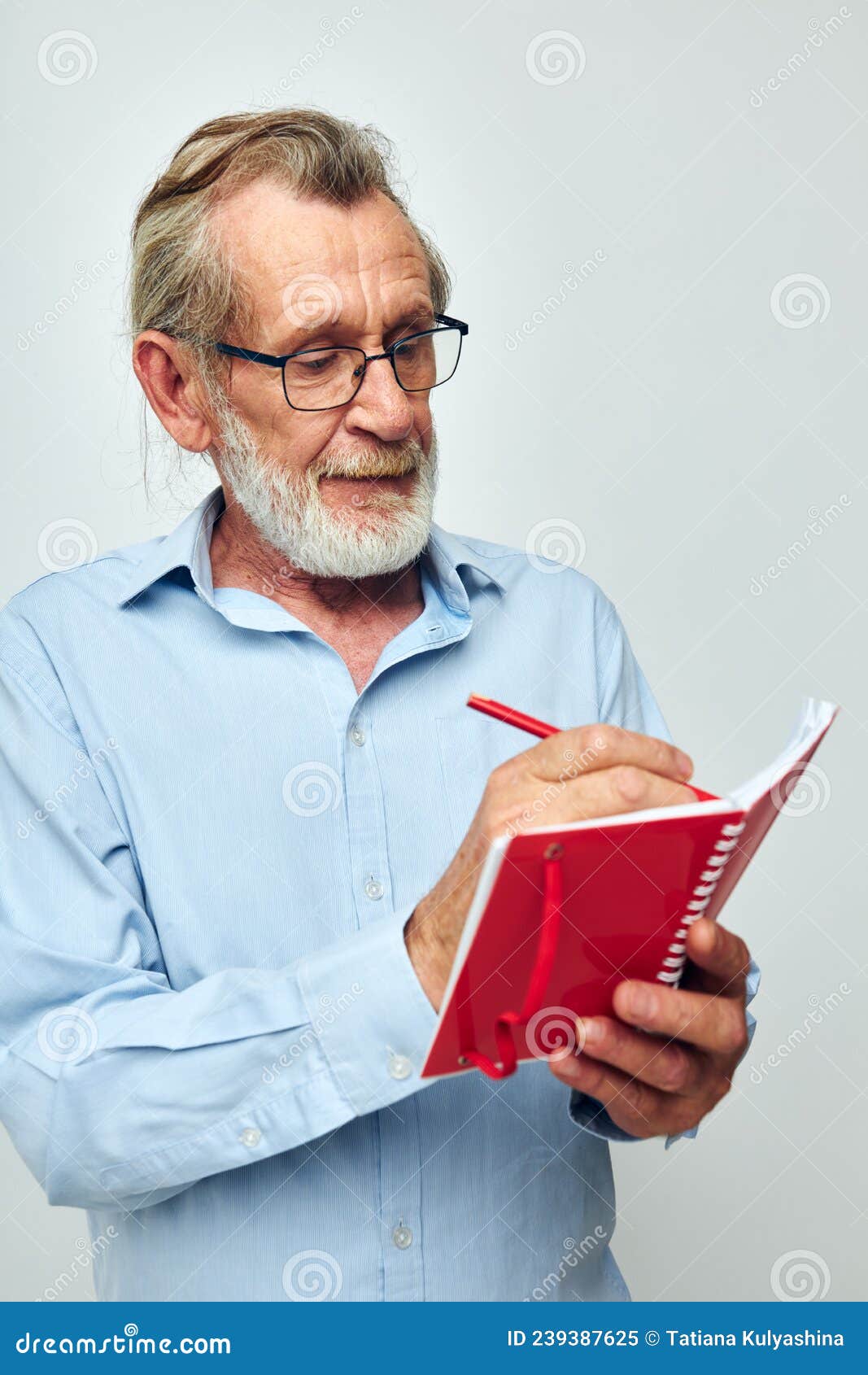 Photo of Retired Old Man Writes Down Emotions in a Notebook Unaltered ...