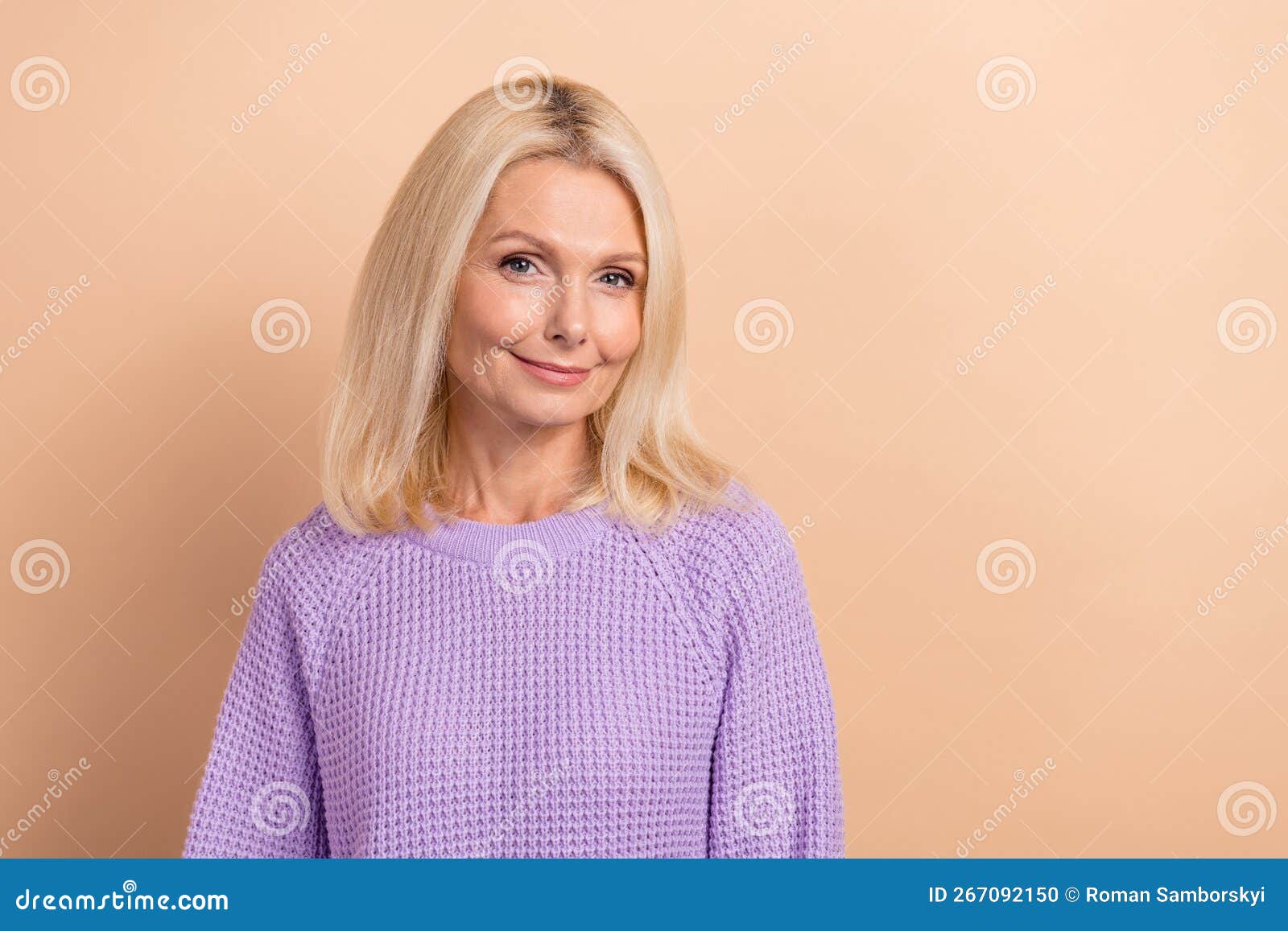 Photo Of Satisfied Glad Pleasant Elderly Lady With Blond Hairdo Wear