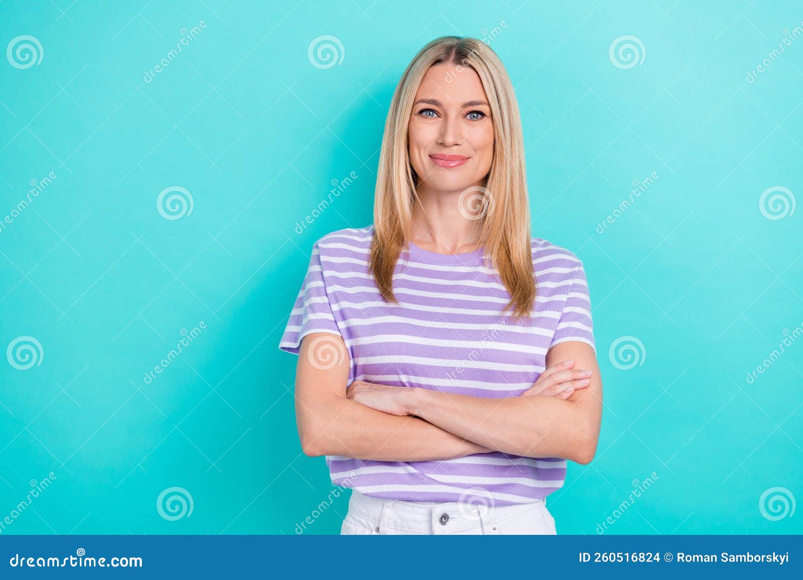 Photo Of Satisfied Glad Pleasant Woman With Straight Hairdo Dressed