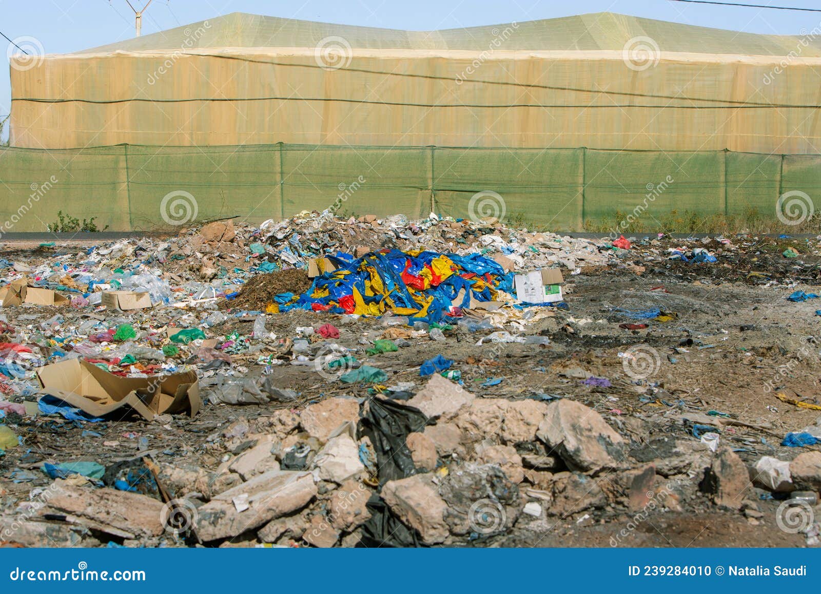 Photo of Scattered Garbage on the Field. the Concept of Waste Disposal ...