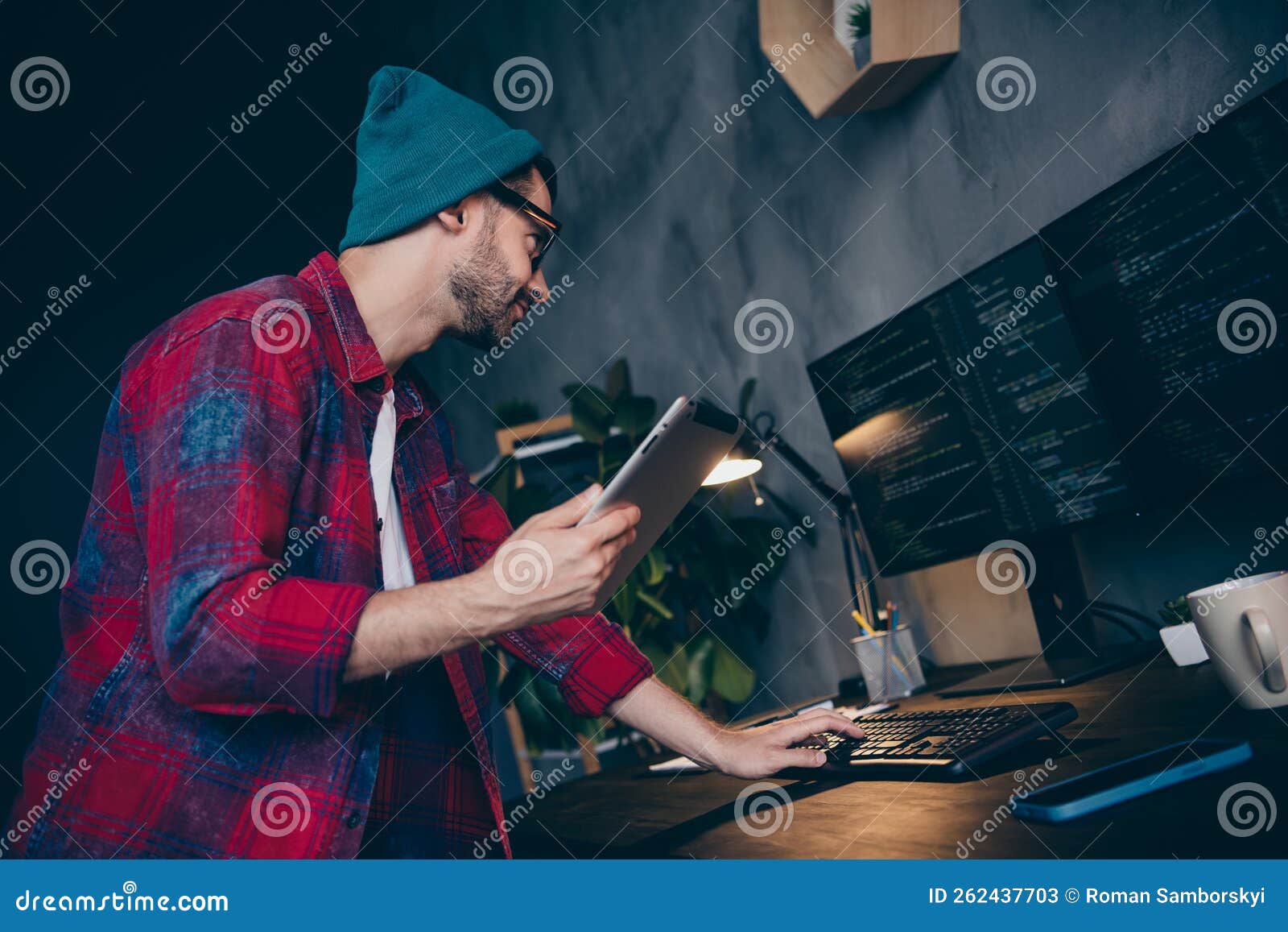 Photo of Serious Busy Coder Dressed Hat Glasses Connecting Ereader To ...