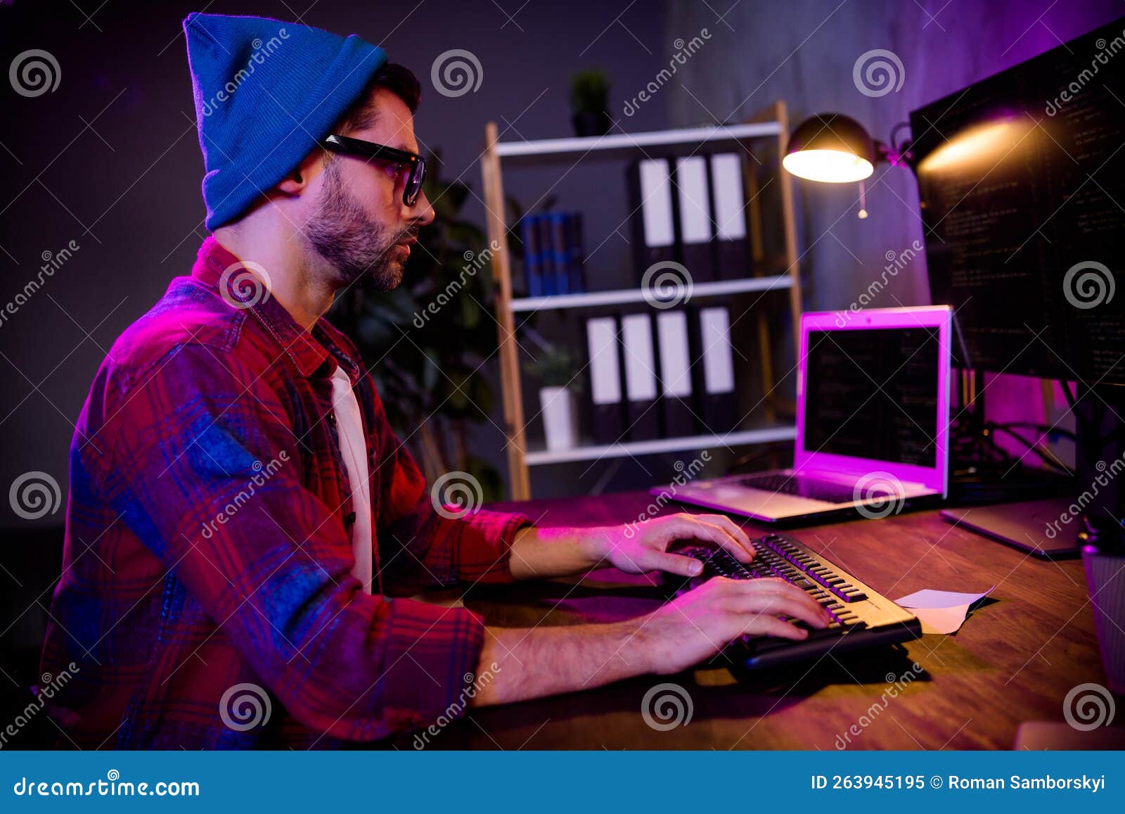 Photo of Serious Confident Coder Dressed Hat Glasses Typing Modern ...