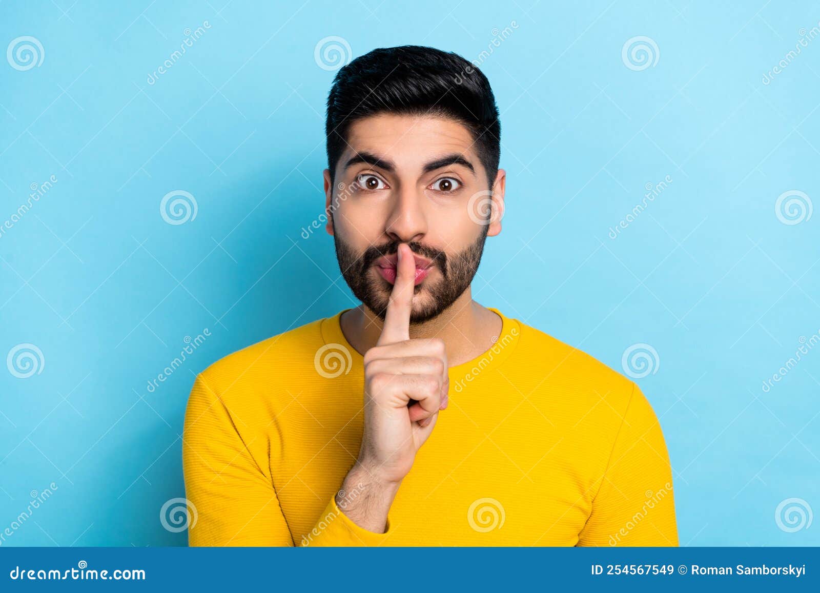 Photo of Serious Confident Guy Dressed Yellow Pullover Finger Lips ...