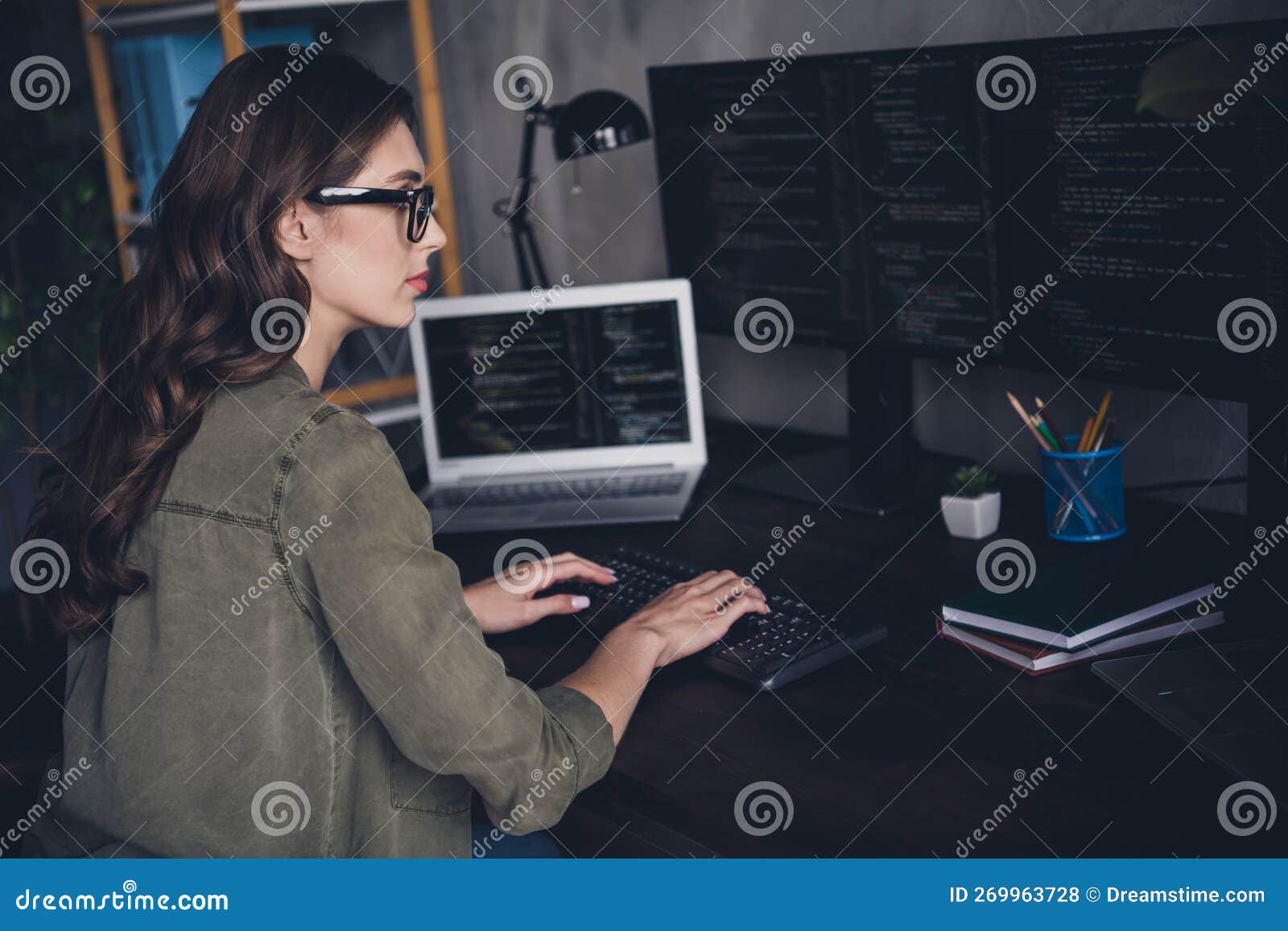 Photo of Serious Confident Lady Hacker Wear Eyeglasses Writing Binary ...