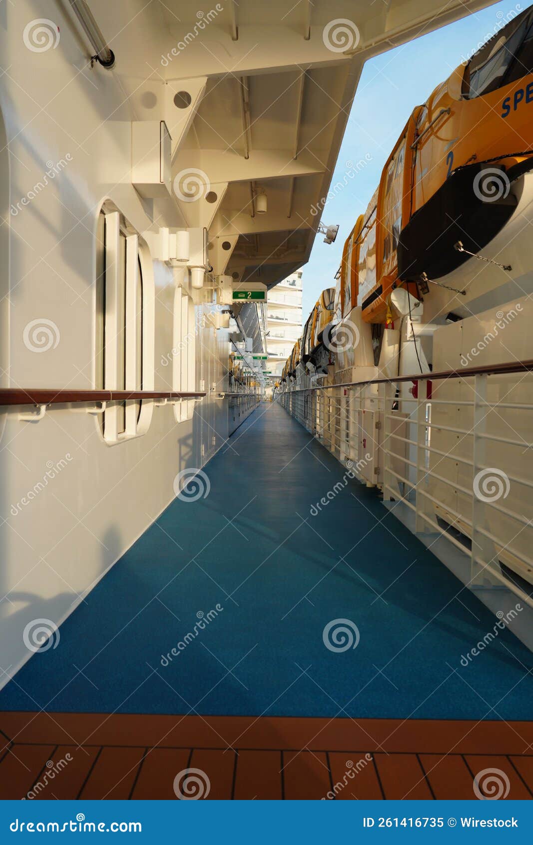 A Photo of a Ship Corridor with Blue Flooring Stock Image - Image of ...