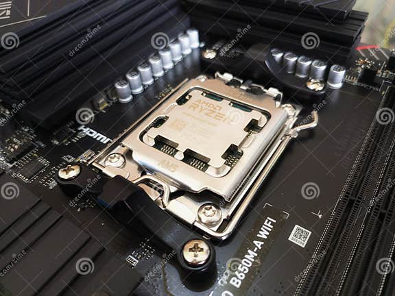 The Photo Shows an AMD Ryzen Processor Installed in an AM5 Socket ...