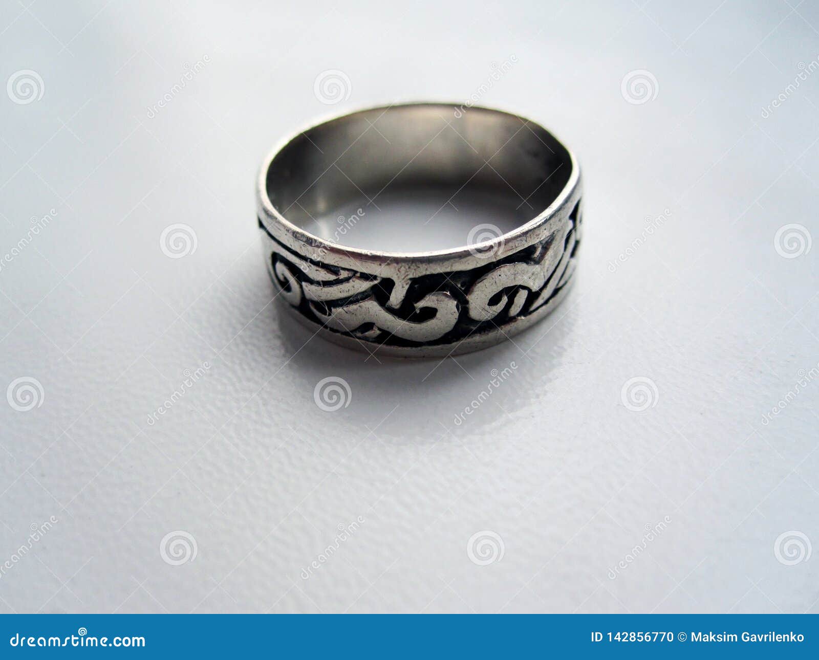 Silver Ring on Gray Background Stock Photo - Image of wreath, siller ...