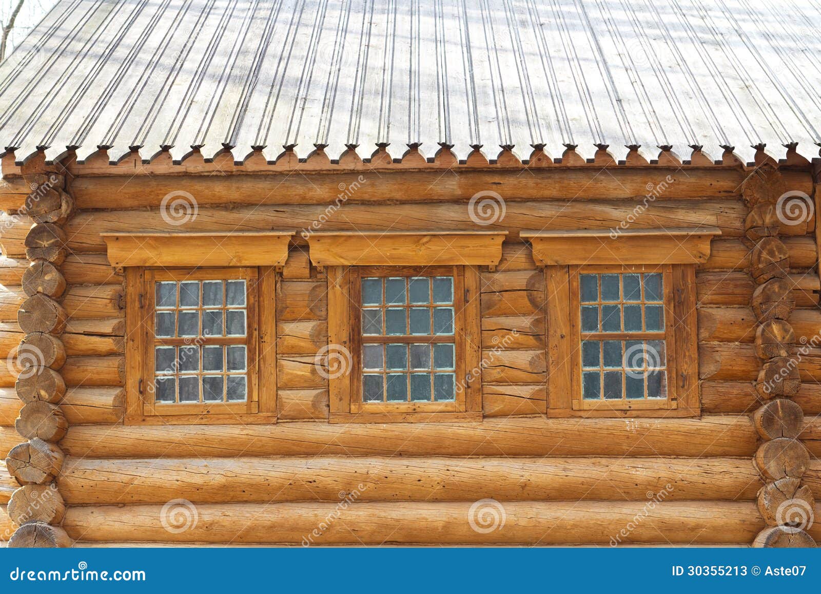 The Photo Shows the Wall of a Wooden House with Windows Stock Image ...