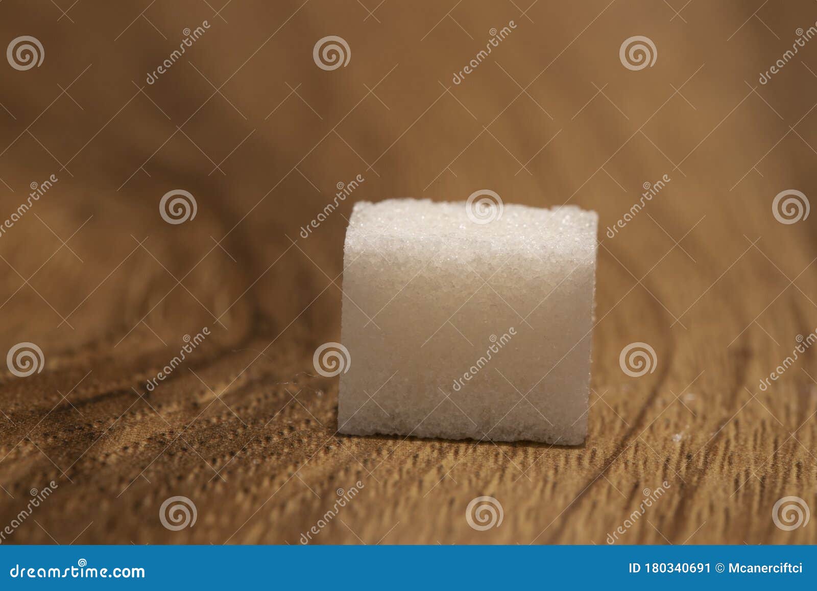 Photo of a Single Sugar Cube on a Wooden Brown Surface Stock Image ...