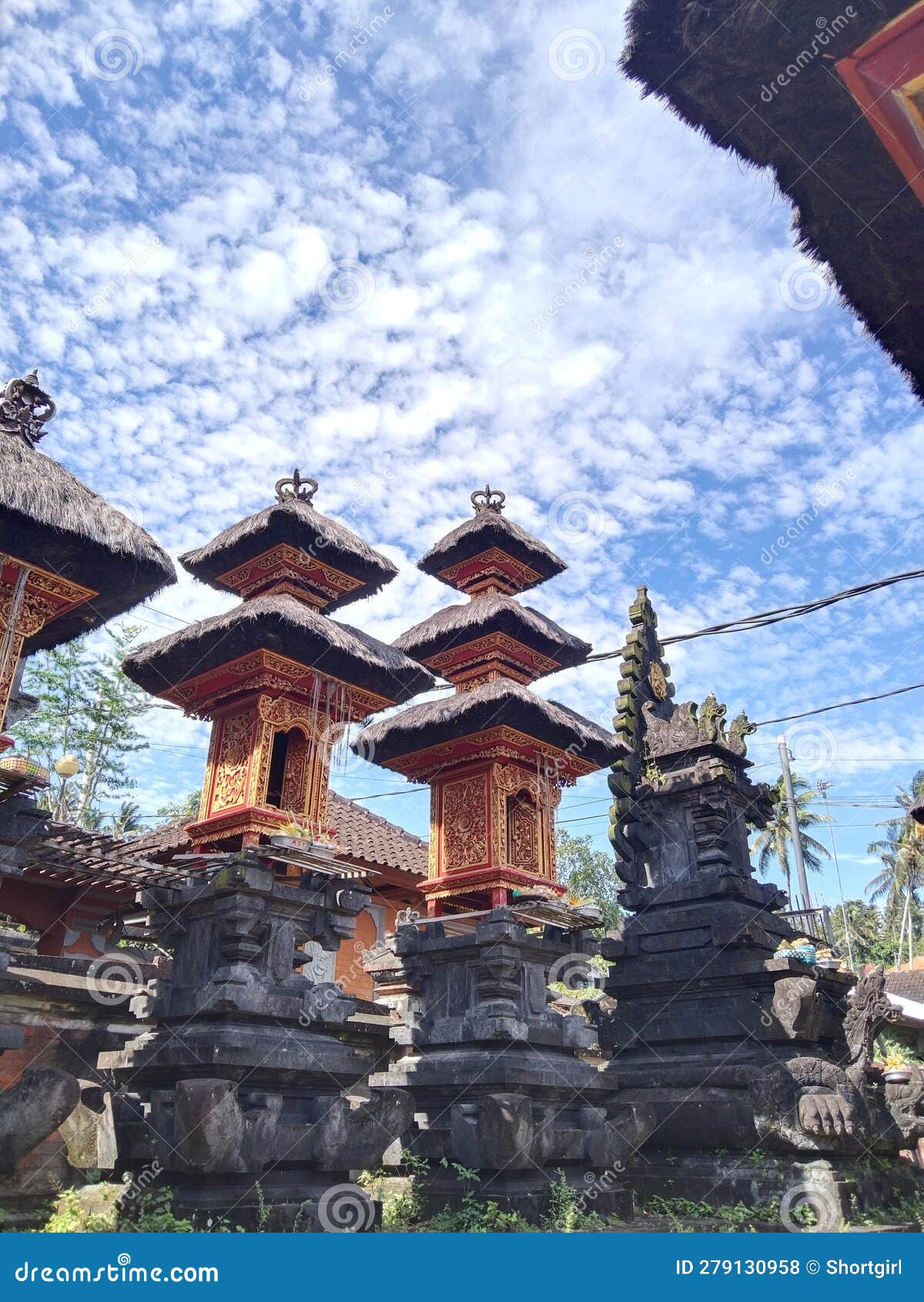A Photo of a Small Temple in Bali when the Sky is Bright Stock Photo ...