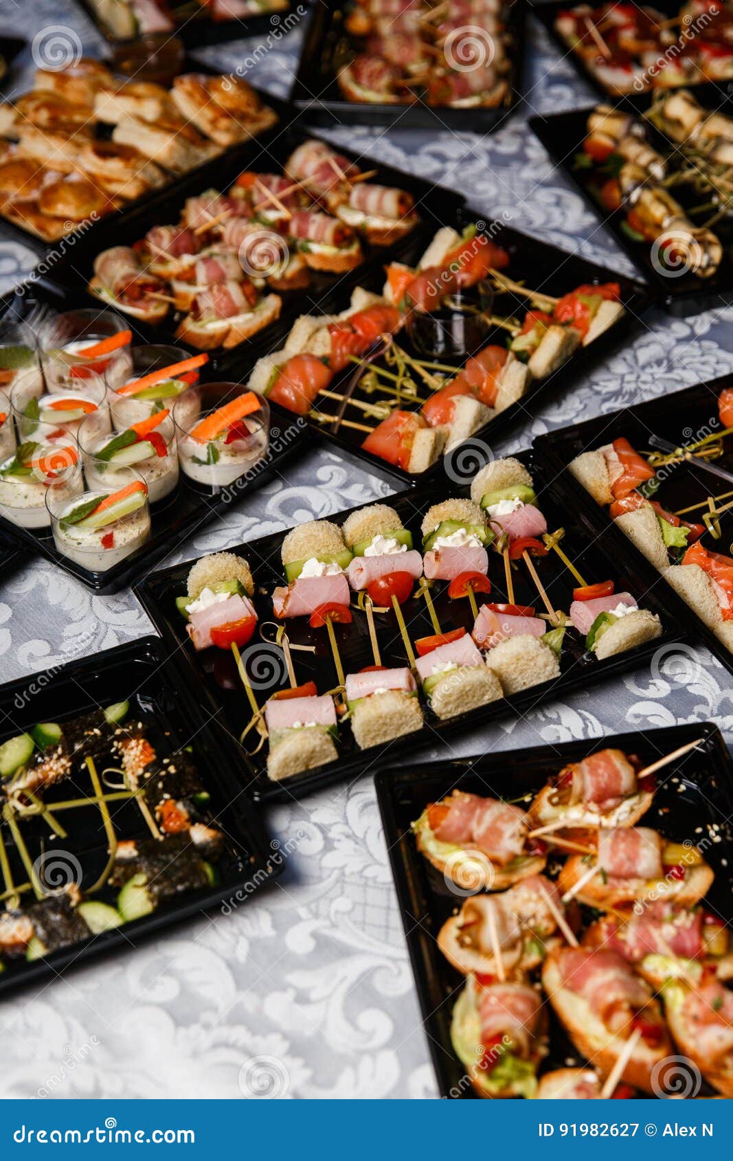 Photo of snacks on plates stock image. Image of glass - 91982627