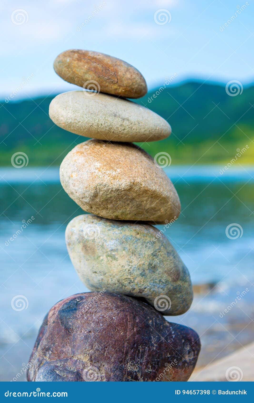 Photo of Stones Balanced on Top of Eachother on a Beach Stock Photo ...