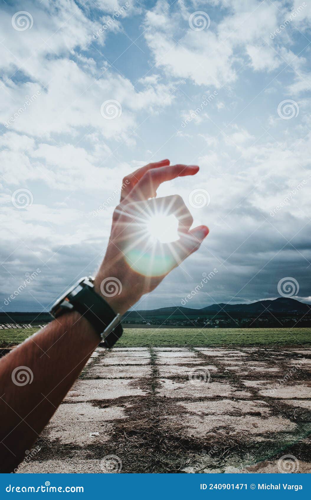Sun between two fingers stock image. Image of photograph - 240901471