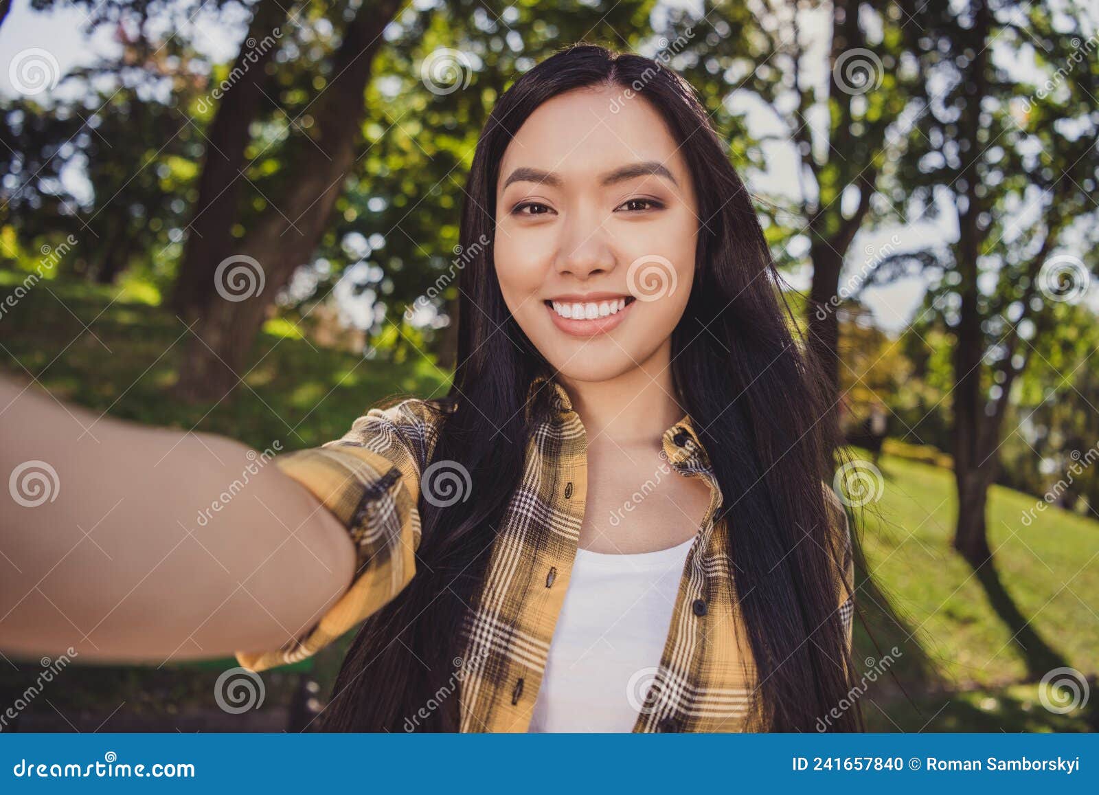 Photo Of Sweet Adorable Young Woman Dressed Plaid Shirt Walking Tacking