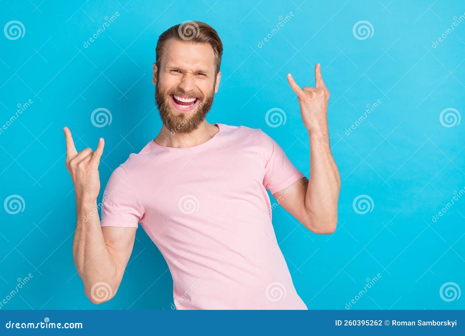 Photo Of Sweet Funky Young Guy Dressed Pink T Shirt Showing Rock Roll