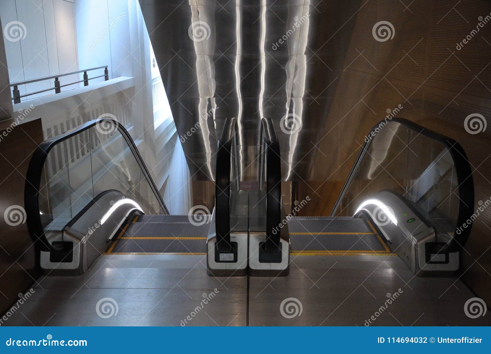 Two Escalators Going Up and Down Stock Photo - Image of commuter, carry ...